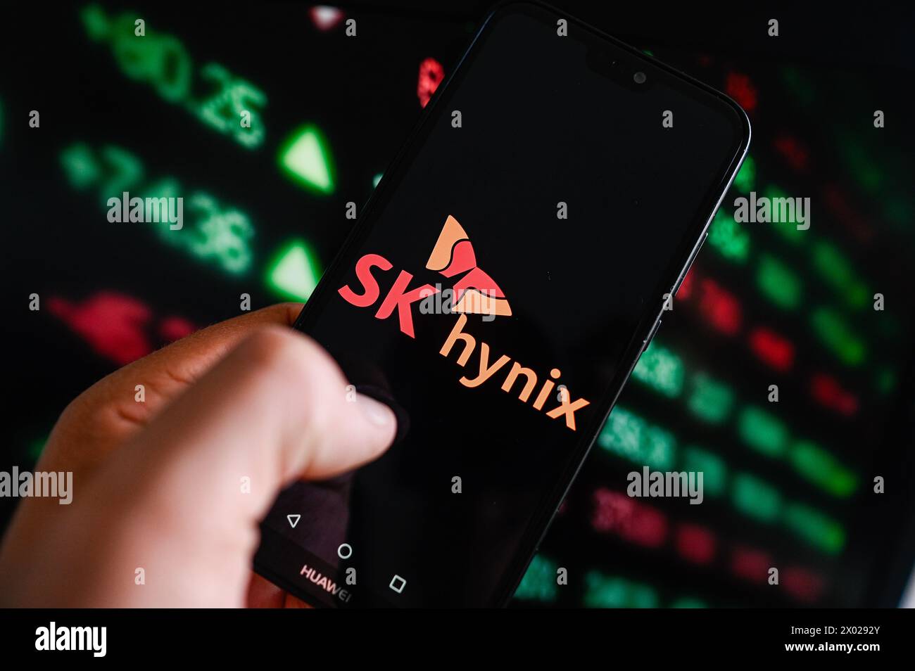 In this photo illustration, a Sk Hynix logo is displayed on a ...