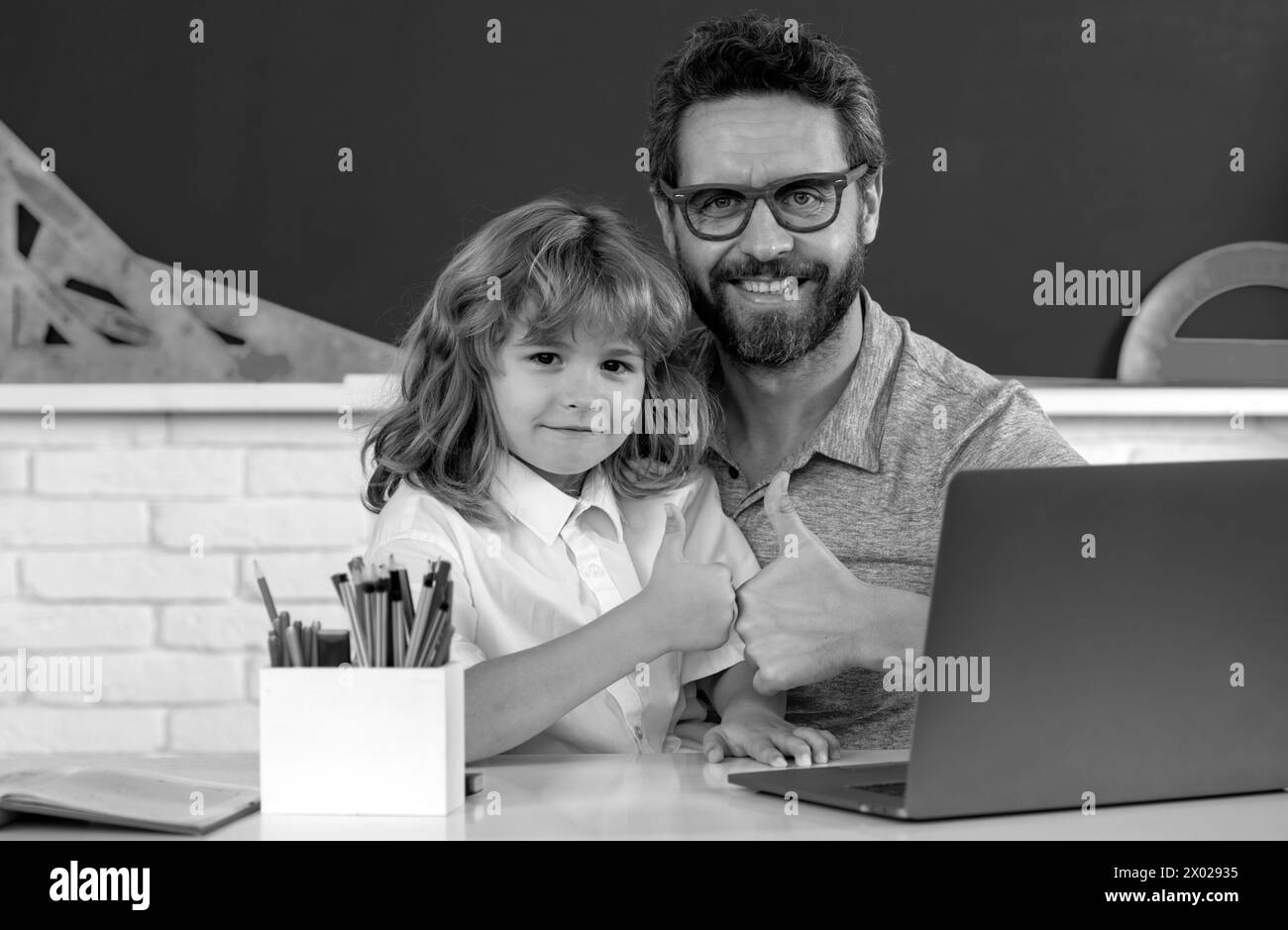 Back to school. Pupil kid student and teacher tutor in classroom at ...