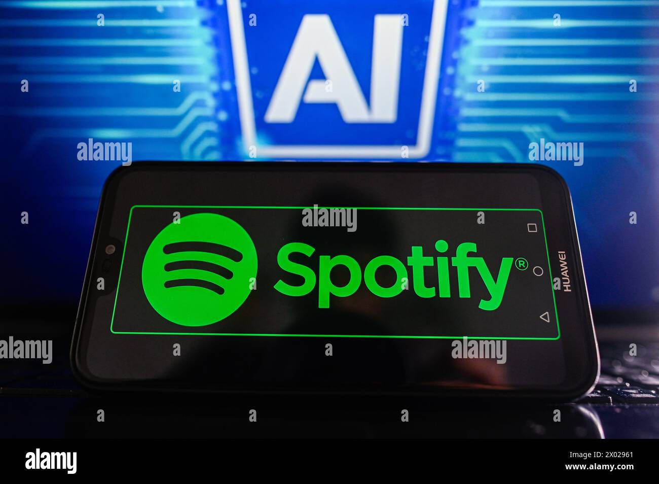 In this photo illustration, a Spotify logo is displayed on a smartphone ...