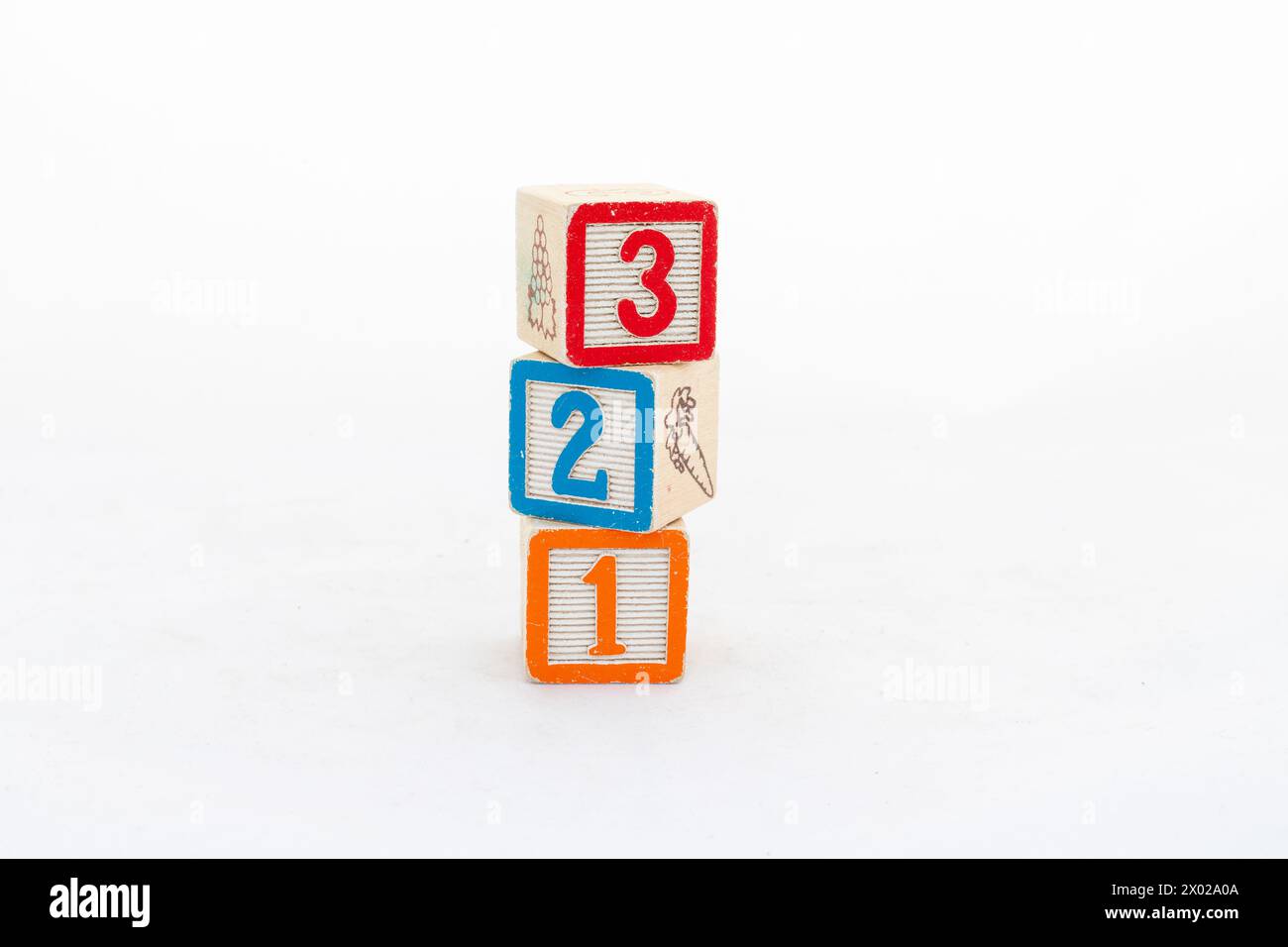 Colorful blocks with numbers stacked and isolated on a white background ...