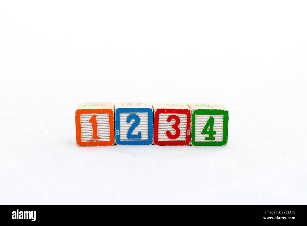 one, two, three and four number wooden blocks isolated on white ...
