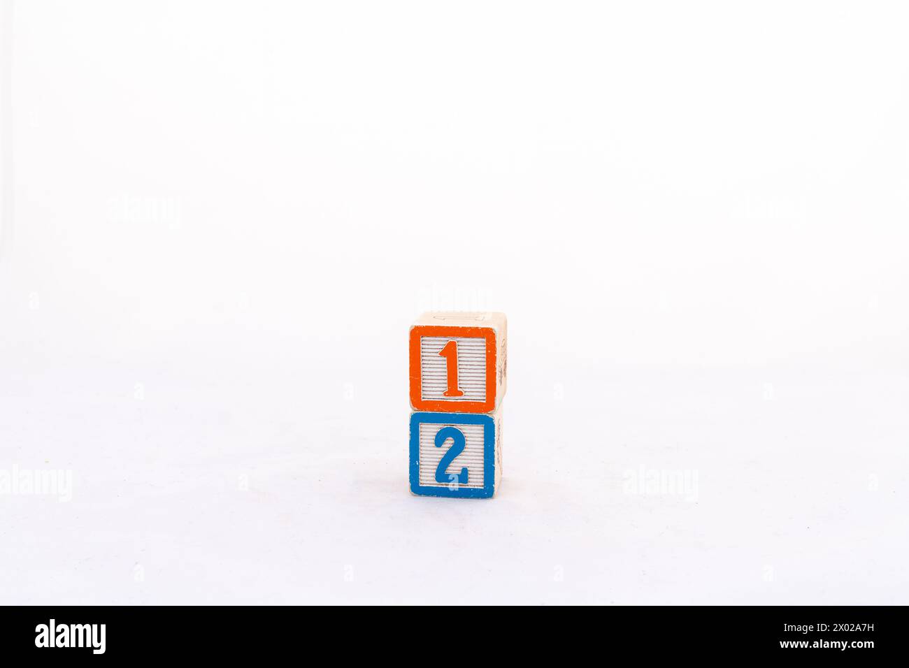 Wooden blocks number one and number two isolated on white background ...