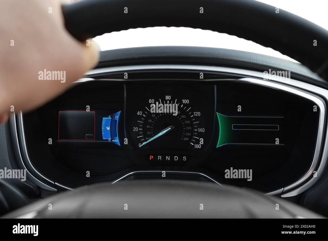 Man driving car with speedometer on dashboard, closeup Stock Photo - Alamy