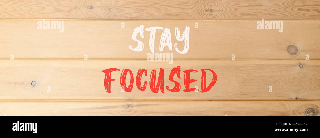 Stay focused symbol. Concept words Stay focused on beautiful wooden ...