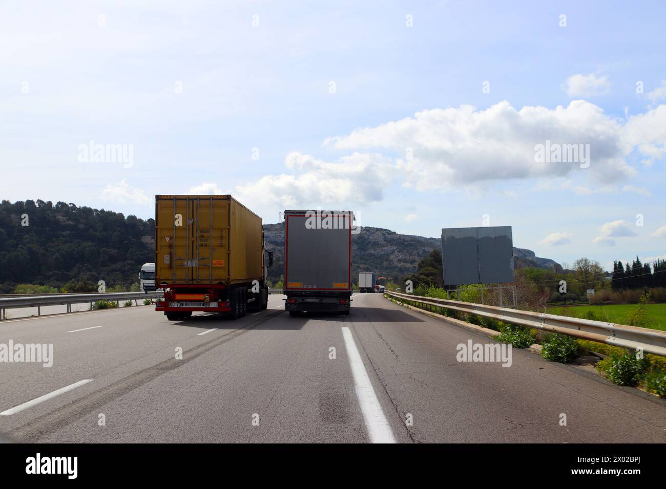 Overtaking trucks on highway hi-res stock photography and images - Alamy