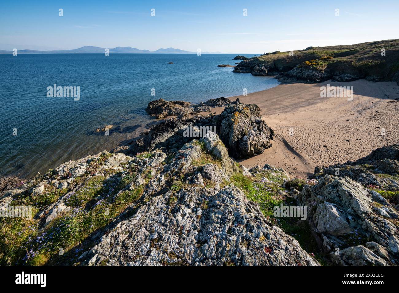 Beautiful view from Llanddwyn Island on Anglesey with the mountains of ...