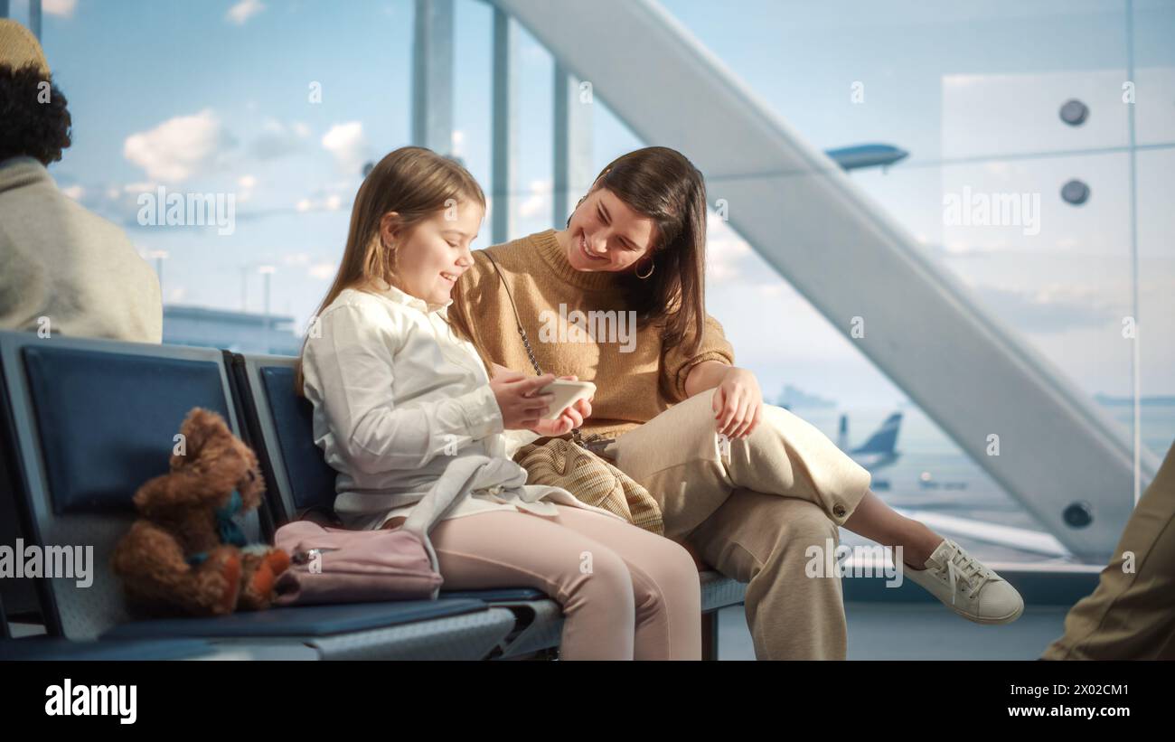 Busy Airport Airplane Terminal: Happy Beautiful Mother and Cute Little ...