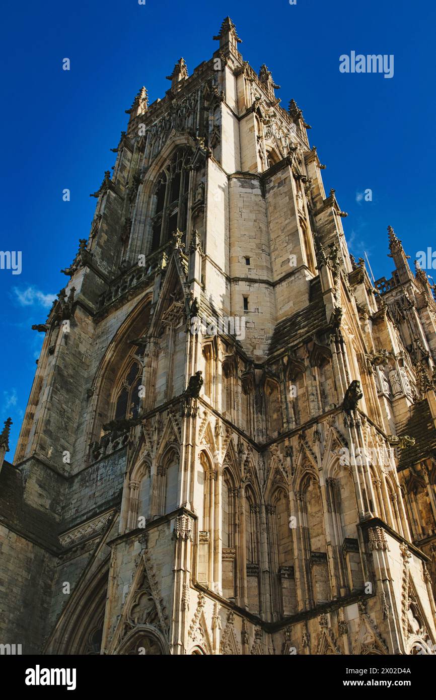Gothic cathedral facade with intricate architecture against a clear ...