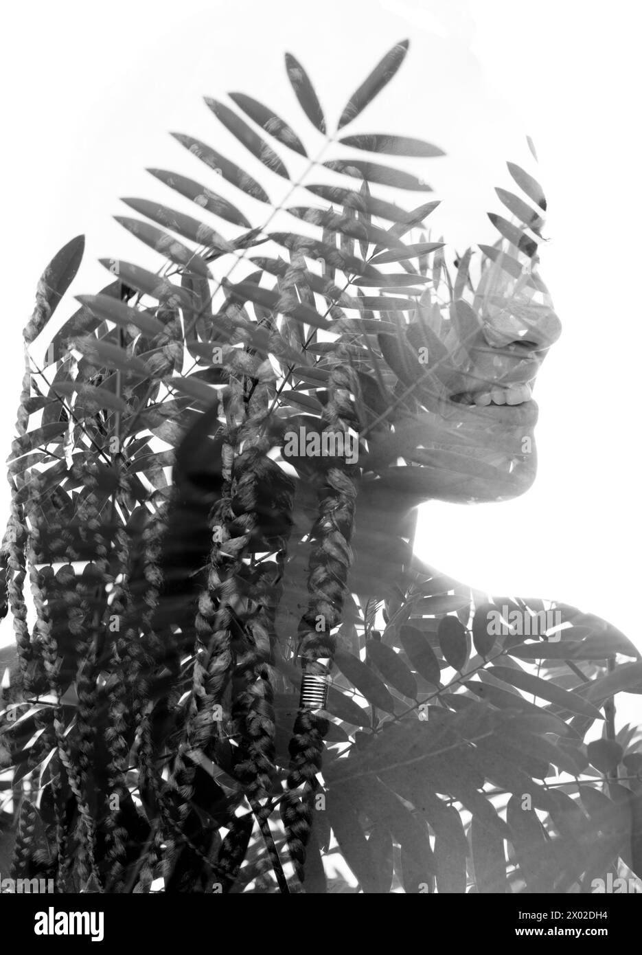 A double exposure female portrait disappearing into background Stock ...