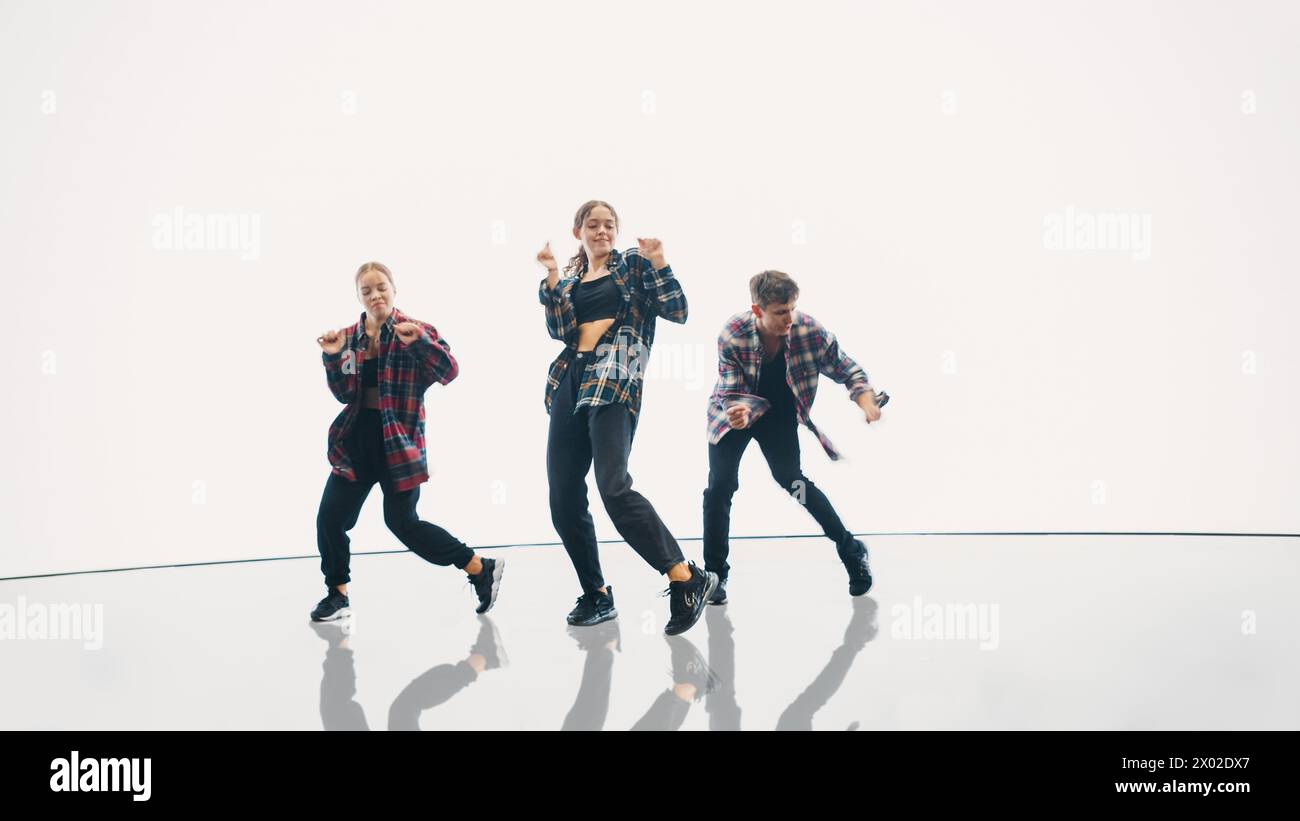Diverse Group of Three Professional Dancers Performing a Hip Hop Dance ...