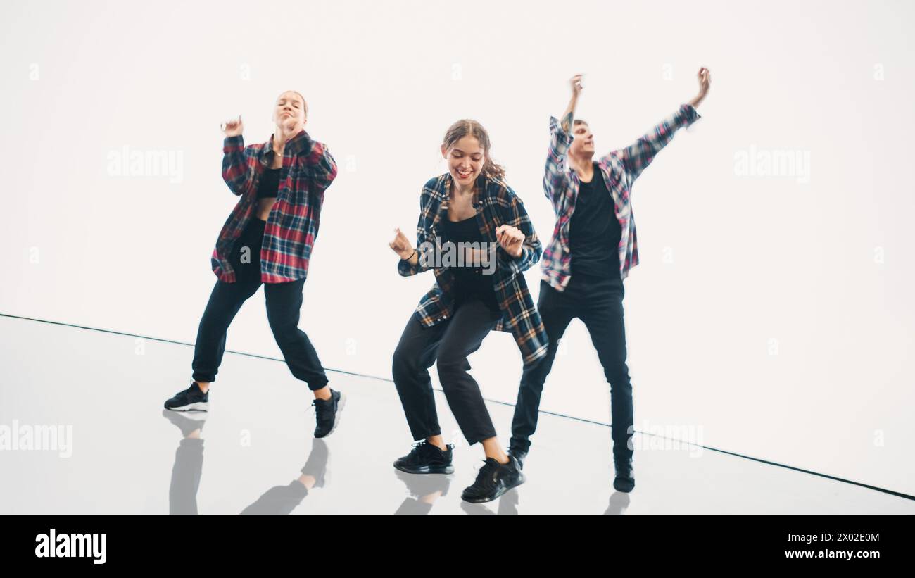 Diverse Group of Three Professional Dancers Performing a Hip Hop Dance ...
