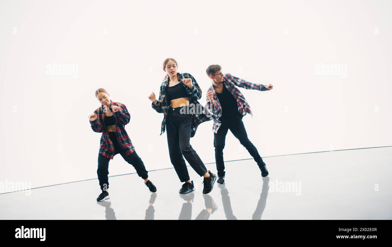 Diverse Group of Three Professional Dancers Performing a Hip Hop Dance ...