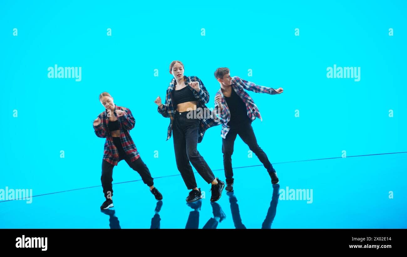 Diverse Group of Three Professional Dancers Performing a Hip Hop Dance ...