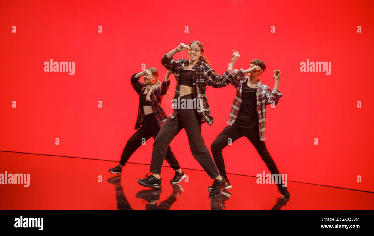 Diverse Group of Three Professional Dancers Performing a Hip Hop Dance ...