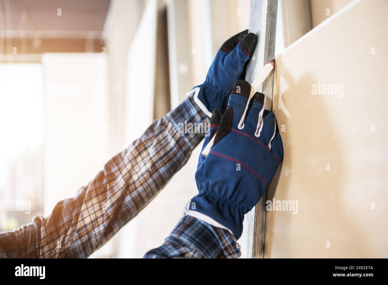 Construction Contractor Worker Marking Cutting Place Using a Pencil ...