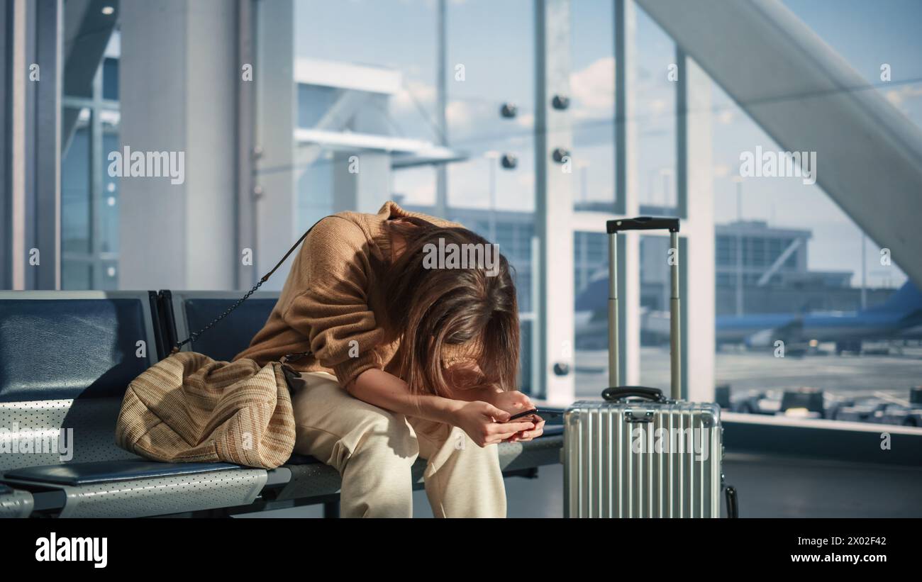 Airport Terminal: Woman Waits for Flight, Uses Smartphone, Receives Bad ...