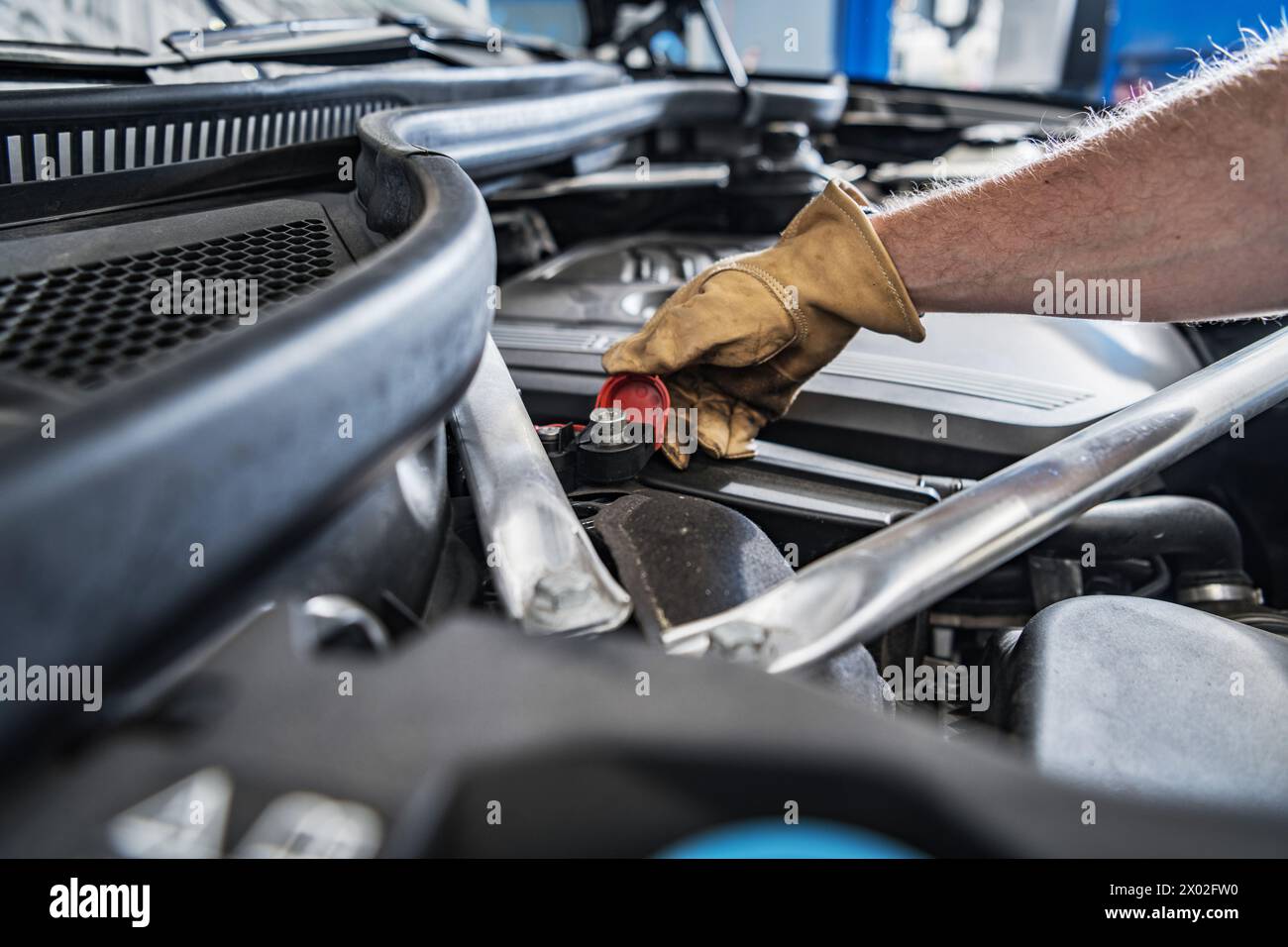 Vehicle Electrical Issues. Car Mechanic Checking on a Battery Stock ...