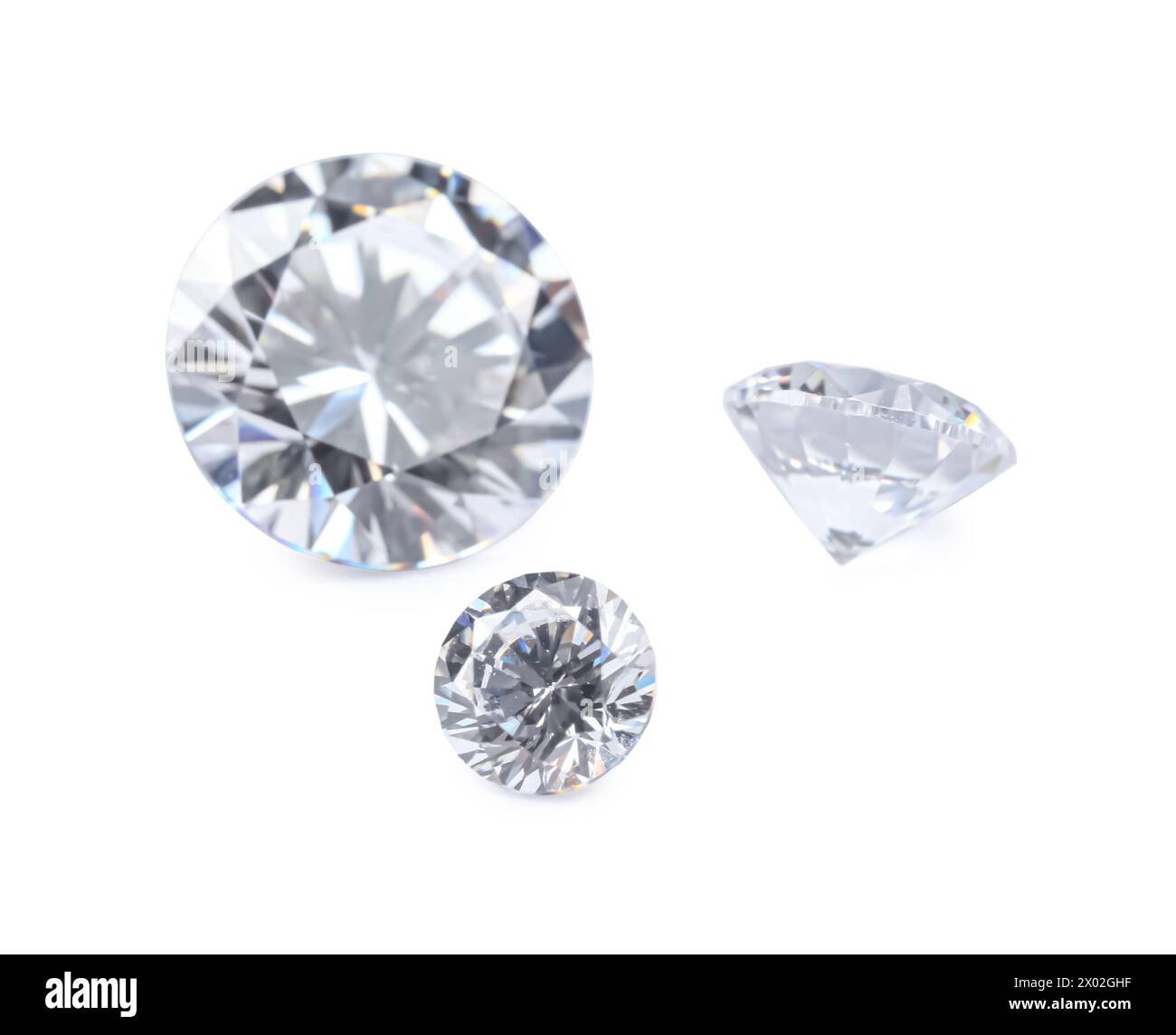 Different beautiful shiny diamonds isolated on white Stock Photo - Alamy