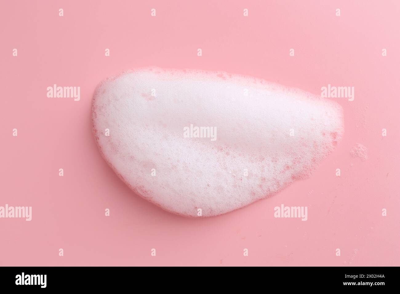 Sample of fluffy foam on pink background, top view Stock Photo - Alamy
