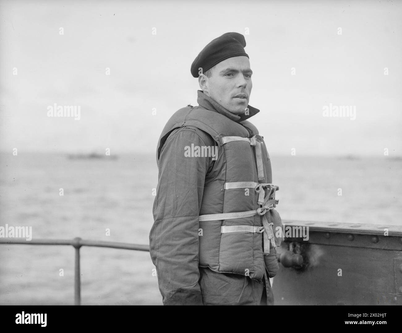 ON BOARD THE BRITISH MERCHANT SHIP EMPIRE KANGAROO IN CONVOY OFF THE ...