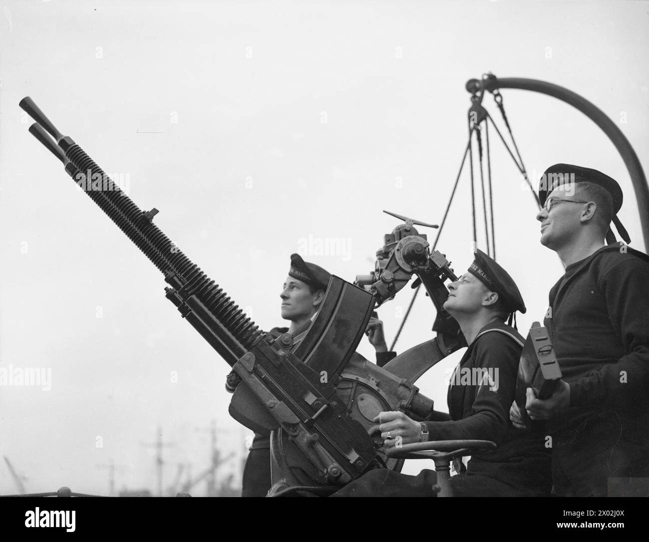 WITH THE ROYAL NETHERLANDS NAVY. 1940, OR 1941. ON BOARD A DUTCH ...