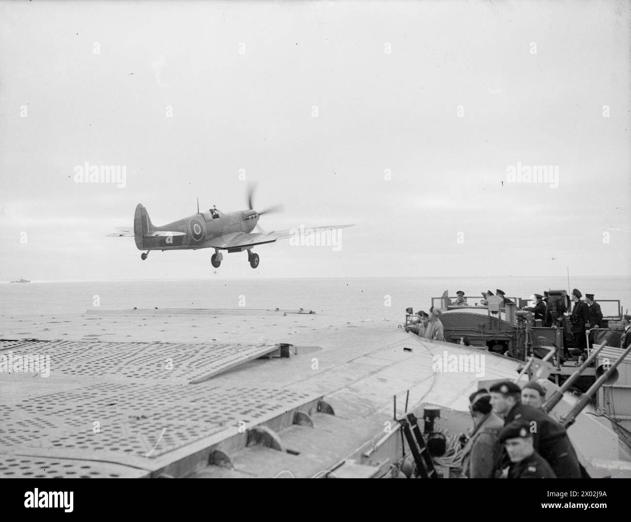 In August 1944, a Seafire aircraft is shown taking off from the flight ...