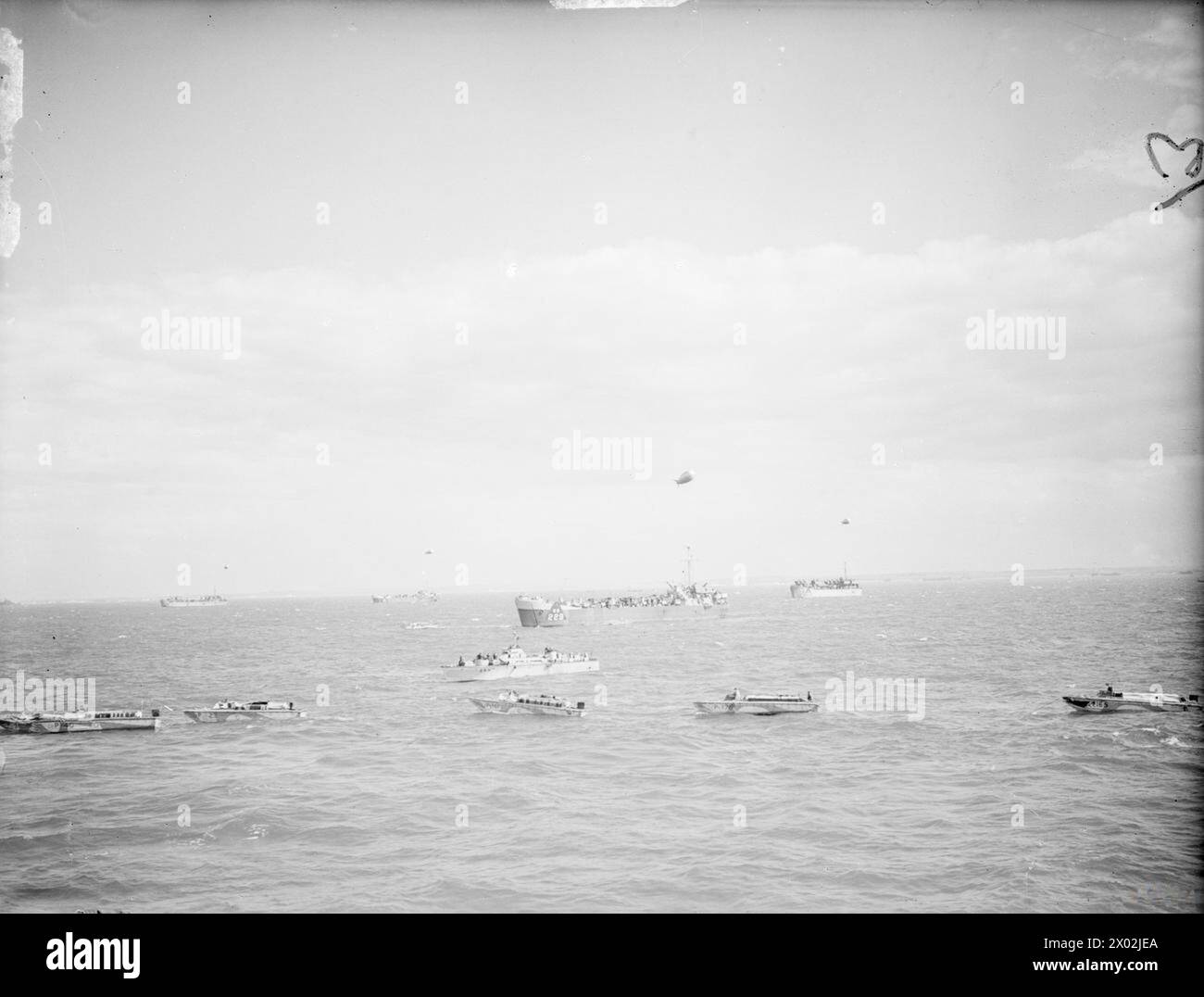 British naval forces, including LSTs, MTBs, and LCP(L)s, are positioned ...