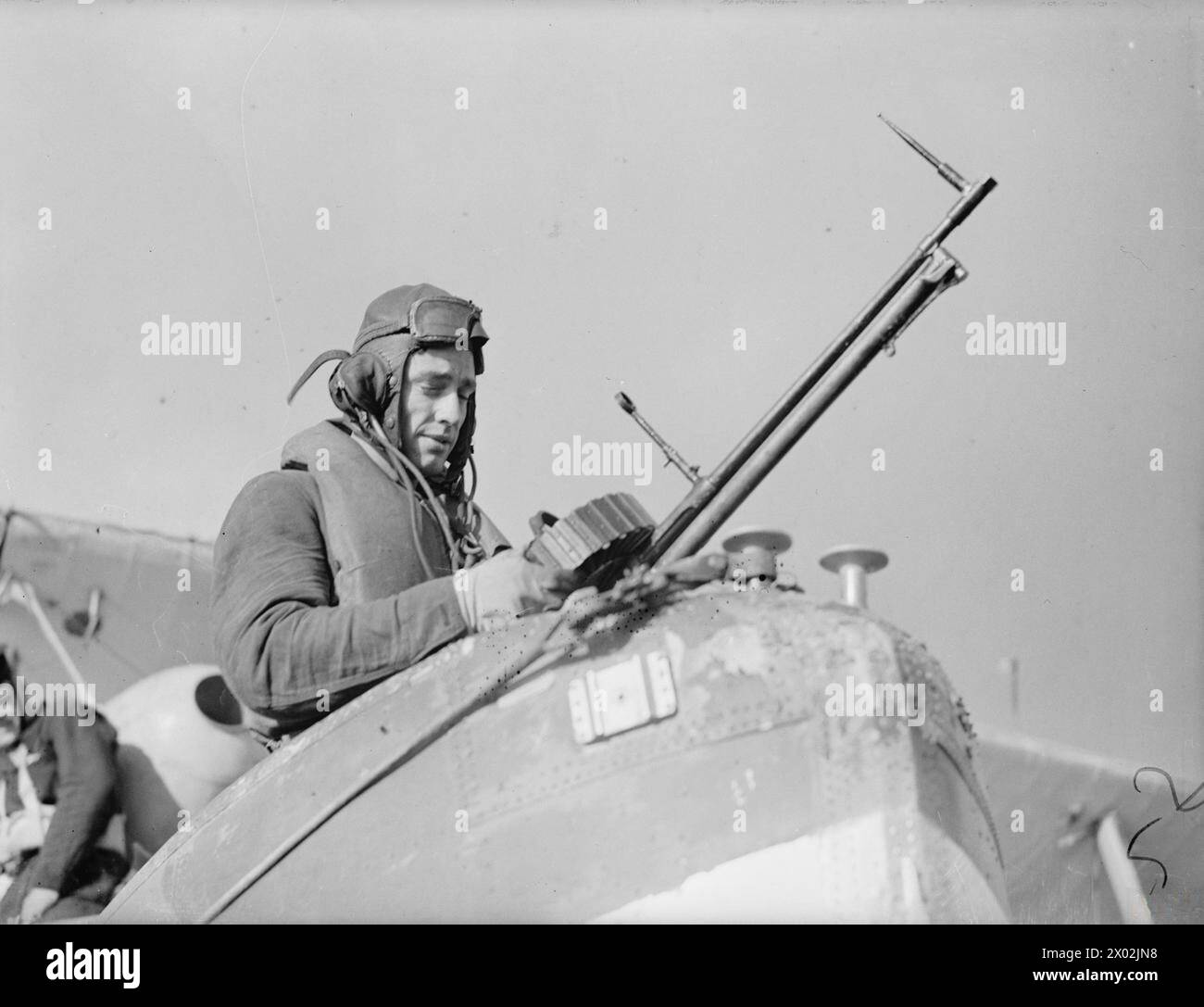 ON BOARD THE AIRCRAFT CARRIER HMS ARGUS. 1940. - Air gunner of the ...