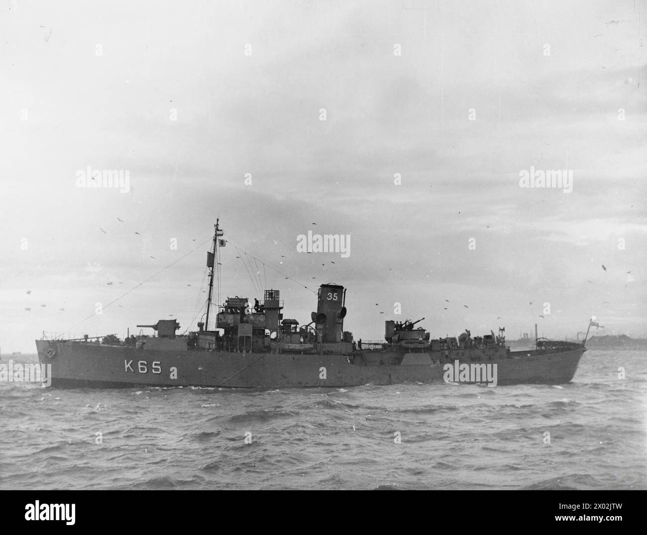 HMS Myosotis, a Royal Navy corvette, is underway at sea during 1941 ...