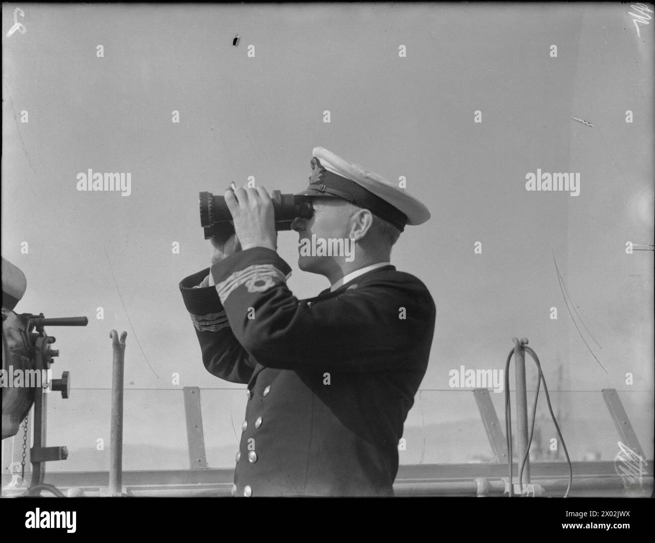Lieutenant Commander A R E Coleman, RCNR, commanding officer of the ...