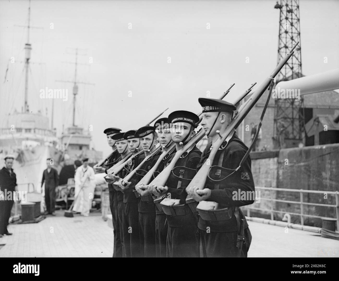 On board the Dutch cruiser HNMS Van Kingsbergen in August 1941, with a ...