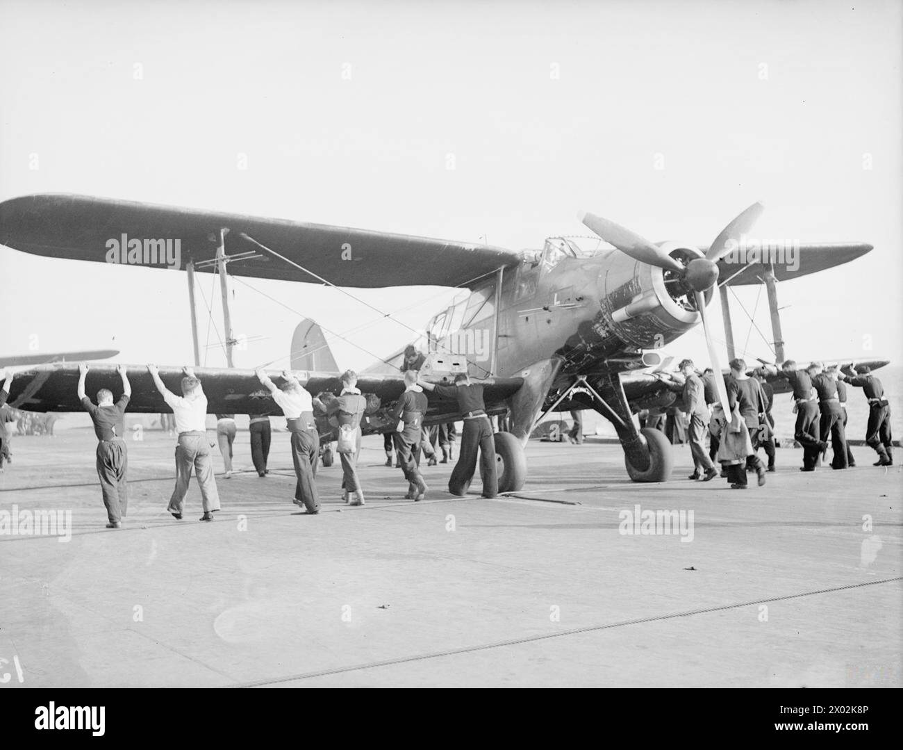 A Fairey Albacore aircraft with full bomb racks is positioned on the ...