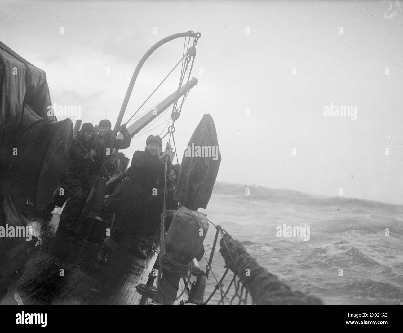 THE BRITISH MINESWEEPER HARRIER. 25 DECEMBER 1943, AT SEA. - Members of ...