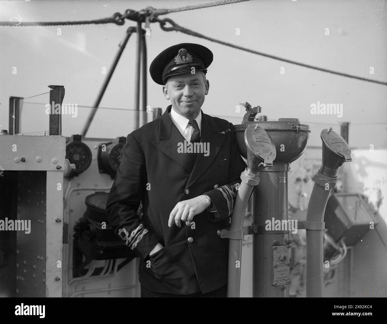 COMMANDER OF HMS LOCH FADA, LOCH CLASS FRIGATE. 1 APRIL 1944, GREENOCK ...