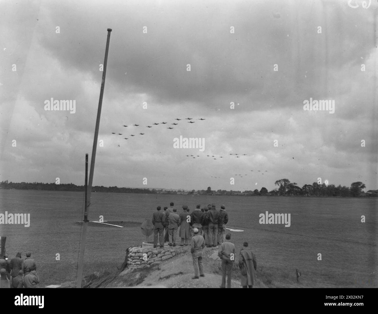 P-47 Thunderbolt aircraft of the 4th Fighter Group fly over Debden air ...