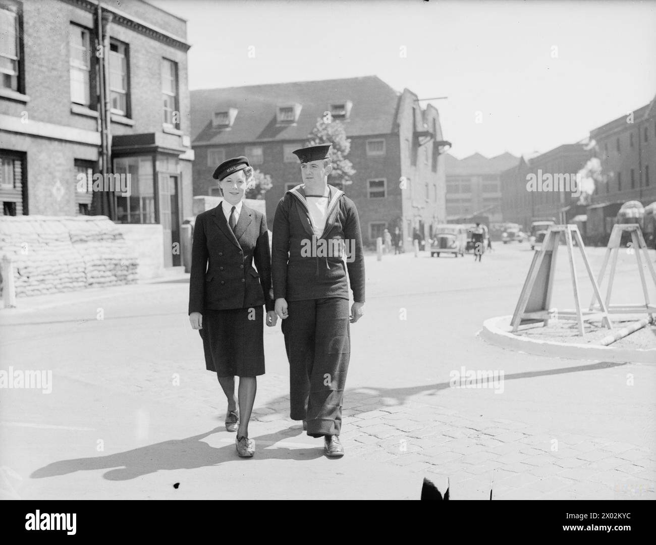 A WREN AND A RATING. 30 JULY 1943, PORTSMOUTH. - A rating of the Senior ...