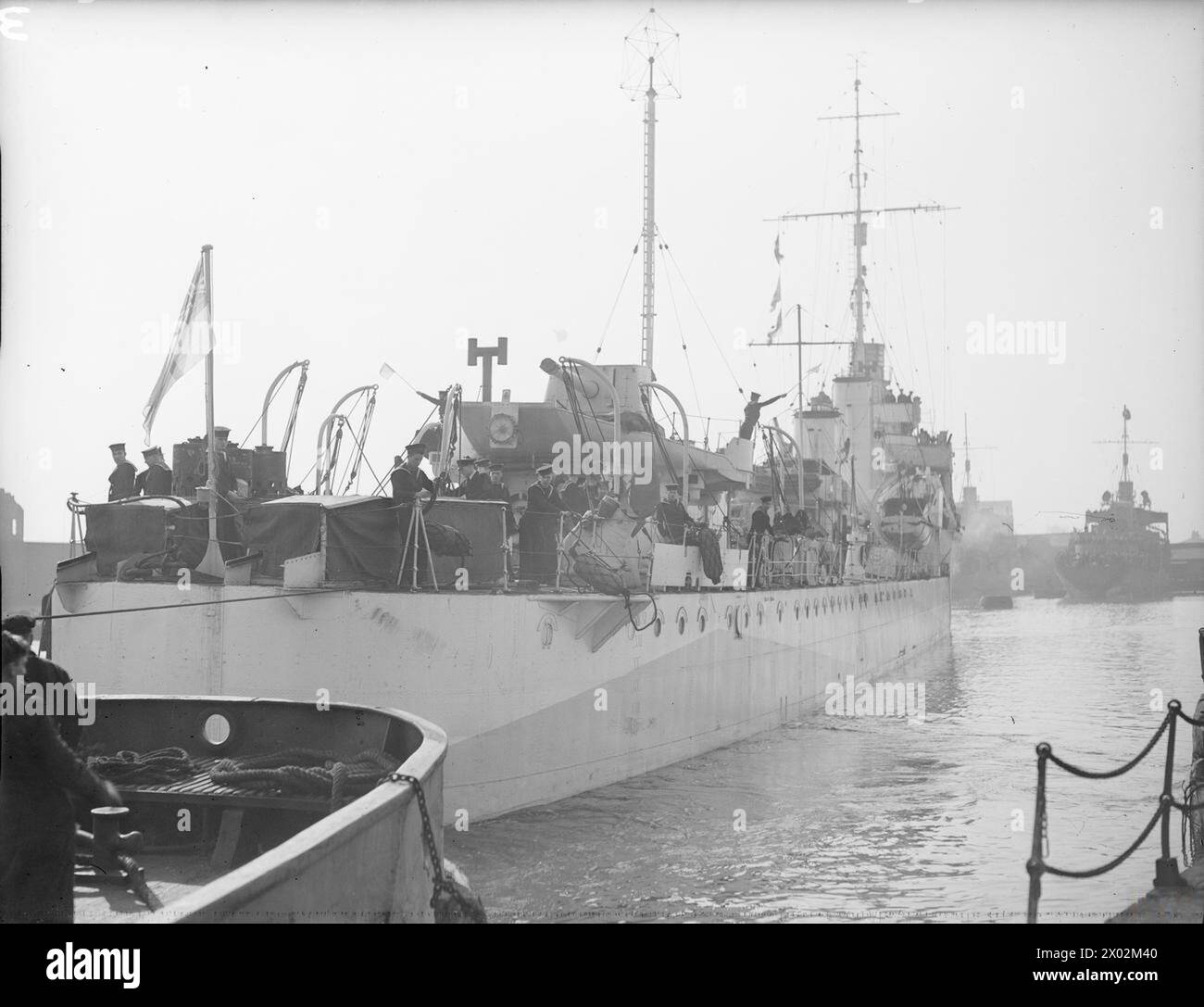 HMS KEPPEL. 10 MARCH 1943, EAST INDIA DOCK. - Three quarters stern view ...
