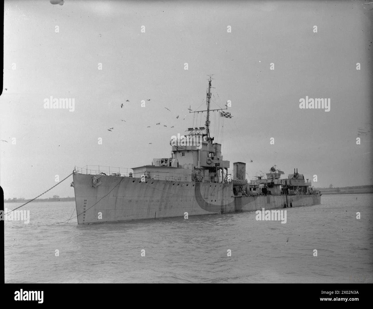 THE ROYAL NAVY DURING THE SECOND WORLD WAR - HMS WHITSHED moored at ...