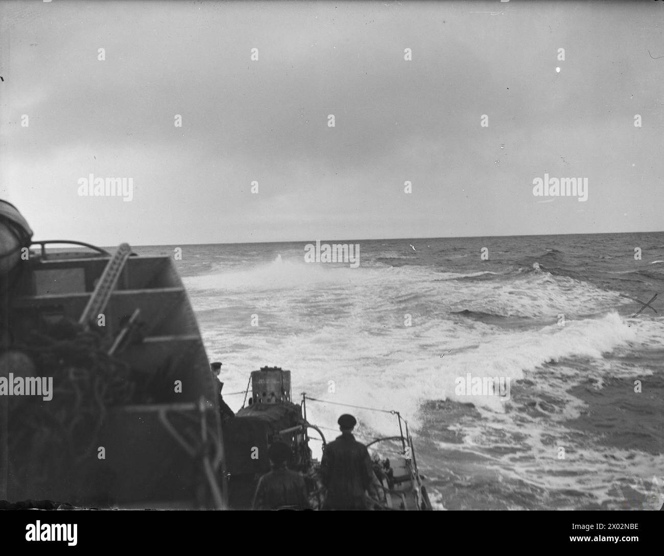 HMS Orwell, a destroyer, is at sea on 3 February 1943 and drops a depth ...