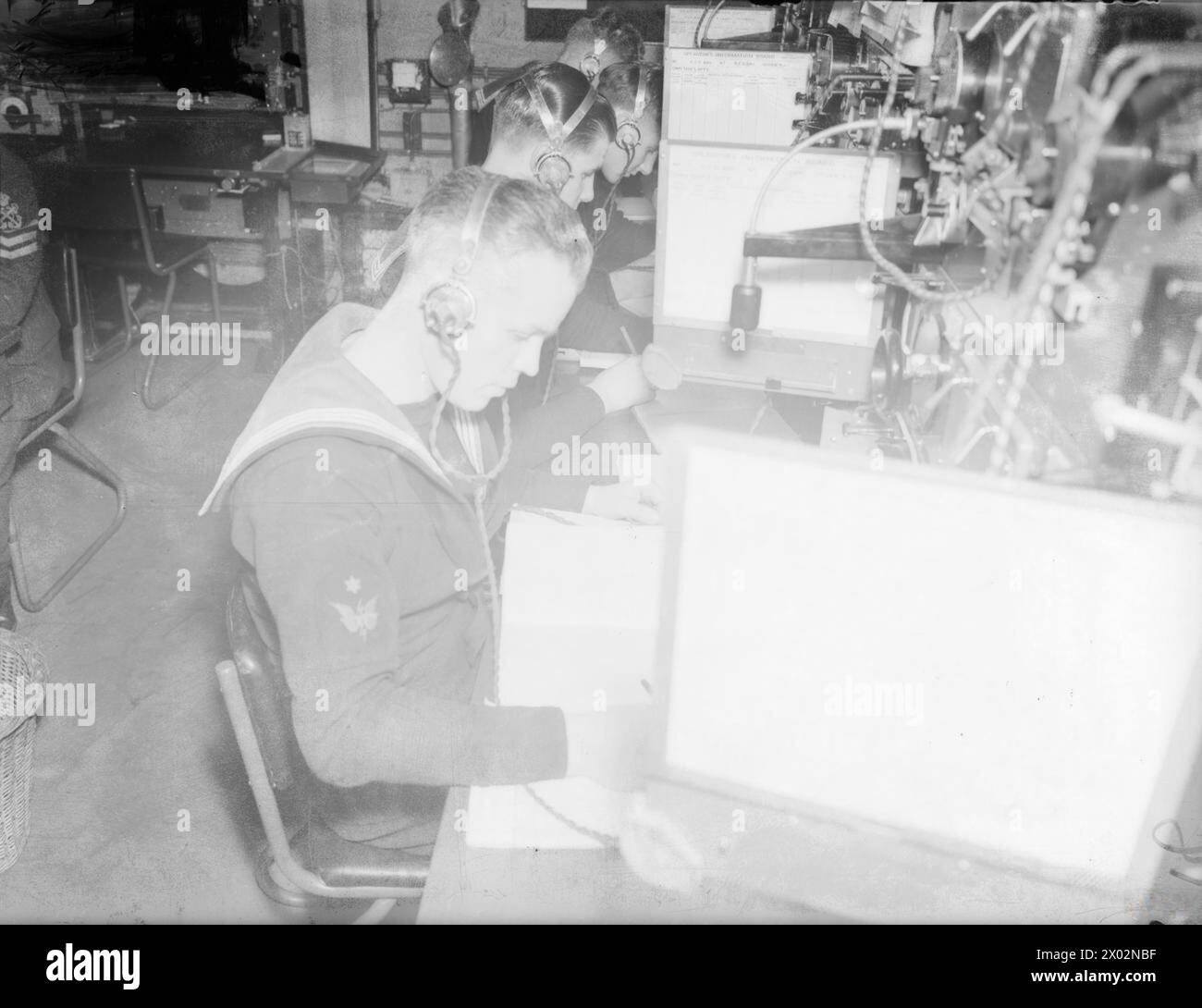 On board HMS King George V in January 1941, the radio room personnel ...