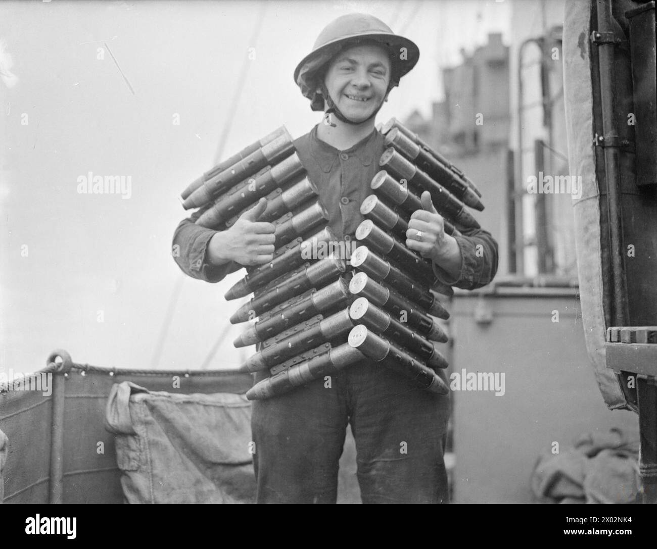 In 1941, a seaman gunner aboard HMS Kelvin carried two belts of 2-pound ...