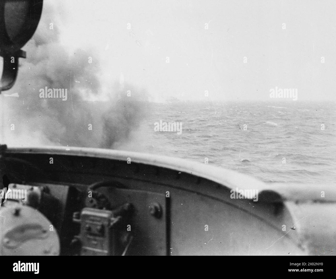 BISMARCK ACTION. 27 MAY, ON BOARD ONE OF THE ATTACKING WARSHIPS CHASING ...