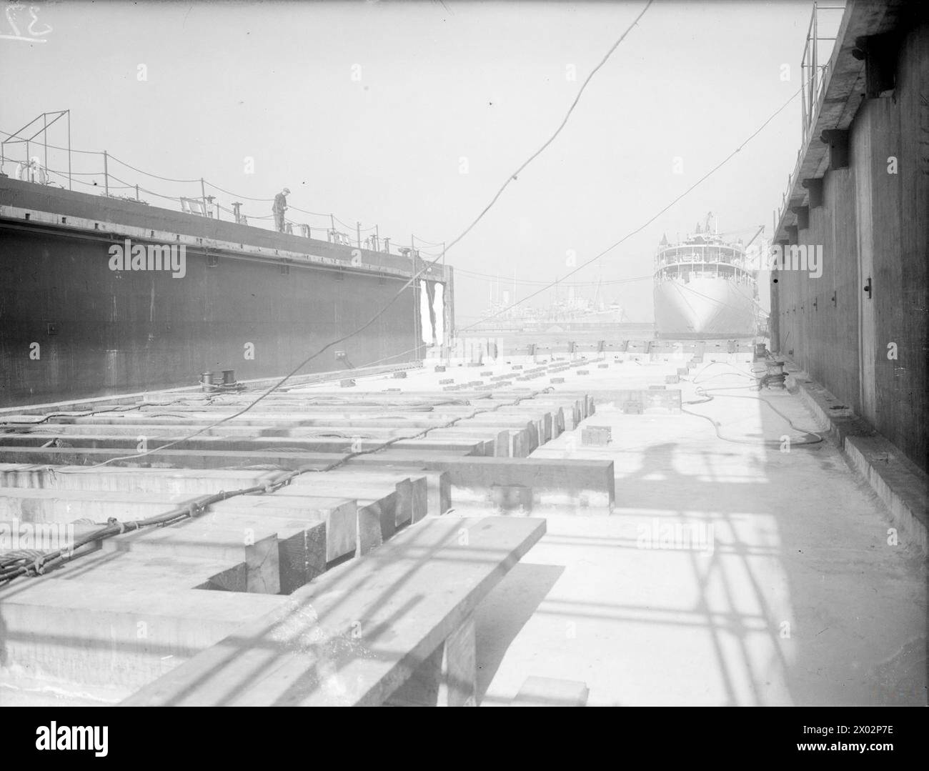 CONCRETE FLOATING DOCK FOR BRITAIN'S FAR EAST NAVY. 21 TO 24 MARCH 1945 ...