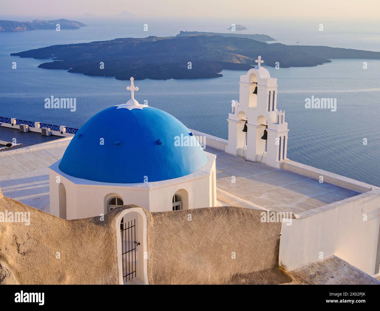Three Bells of Fira, iconic blue domed church at sunset, Fira ...