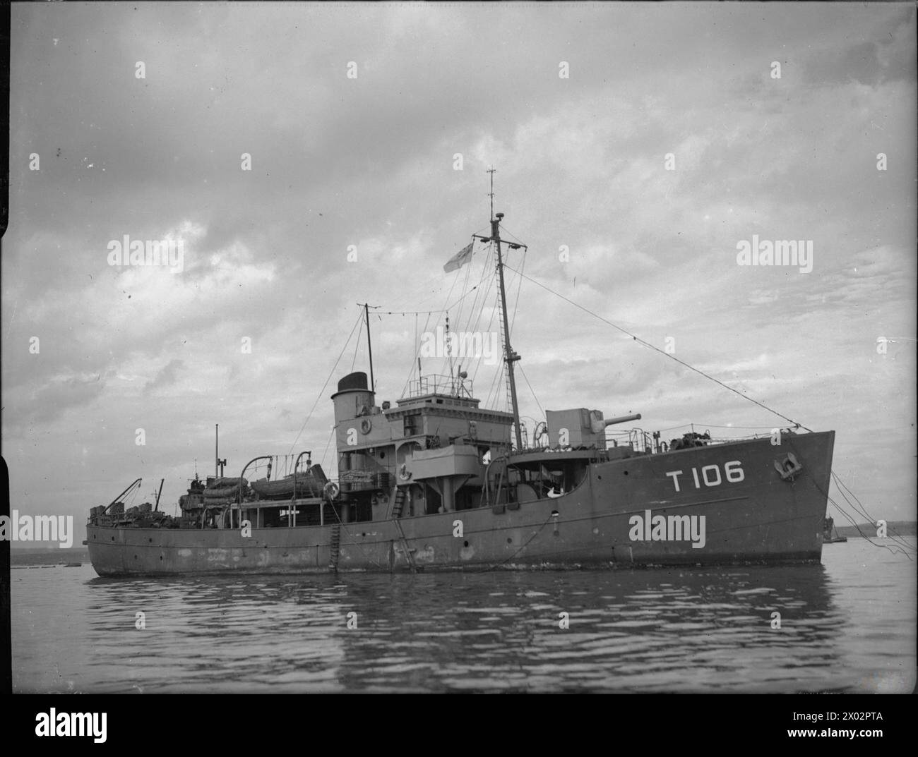 HMT Coverley, a Royal Navy ship, operates in coastal waters off Naples ...