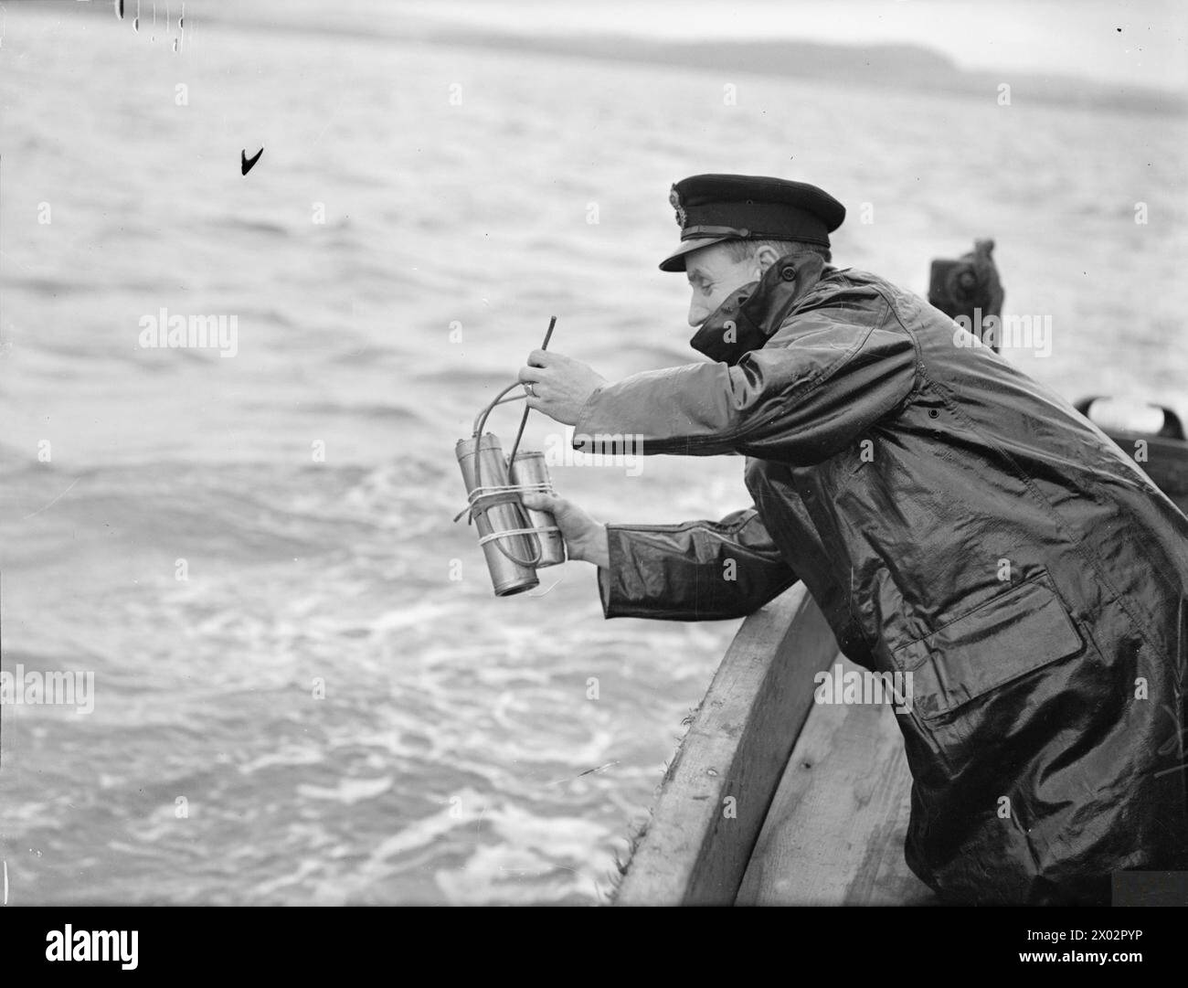 EXPLORING FOR AN ACOUSTIC MINE WITH SMALL EXPLOSIVE CHARGES. 1940, ON ...