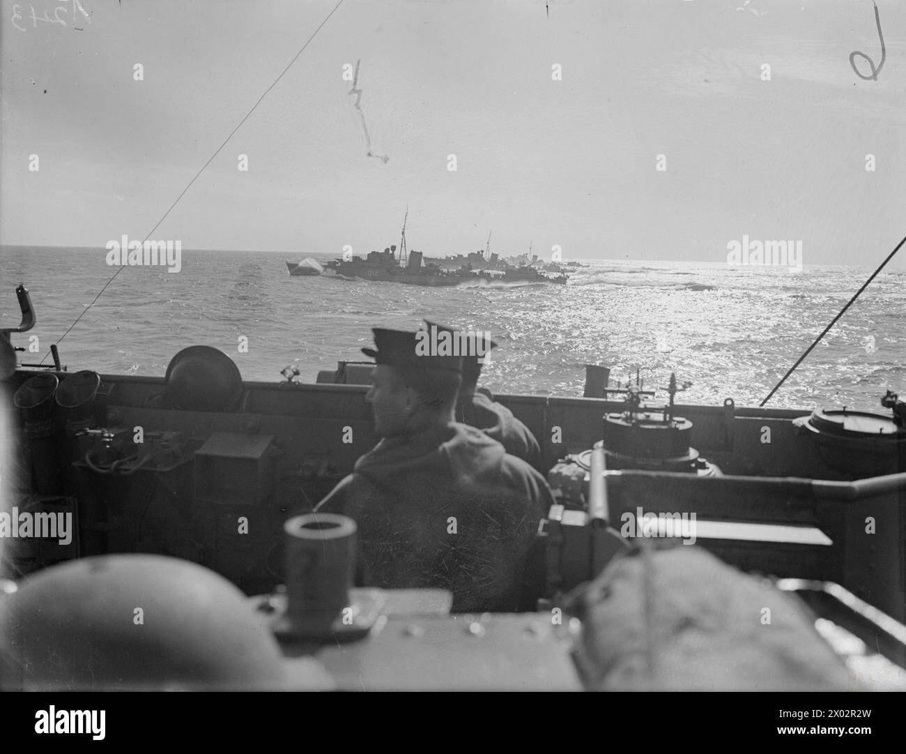 Destroyers of a flotilla maneuver in line abreast formation aboard HMS ...