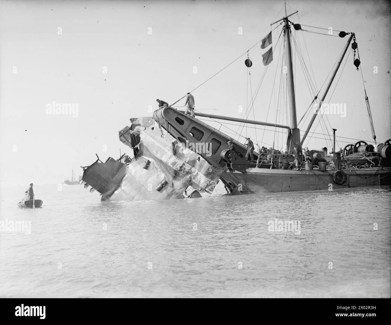 SALVAGE OF HMS GIPSY. 21 MARCH 1943, FELIXSTOWE. - Views of a large ...