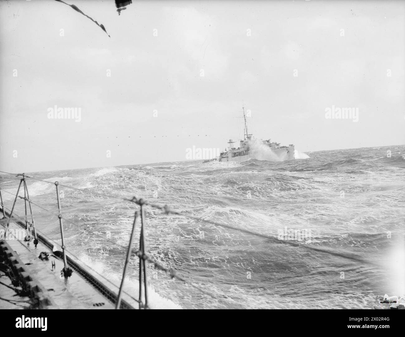 HMS Magpie, a Modified Black Swan-class sloop, conducts patrols at sea ...