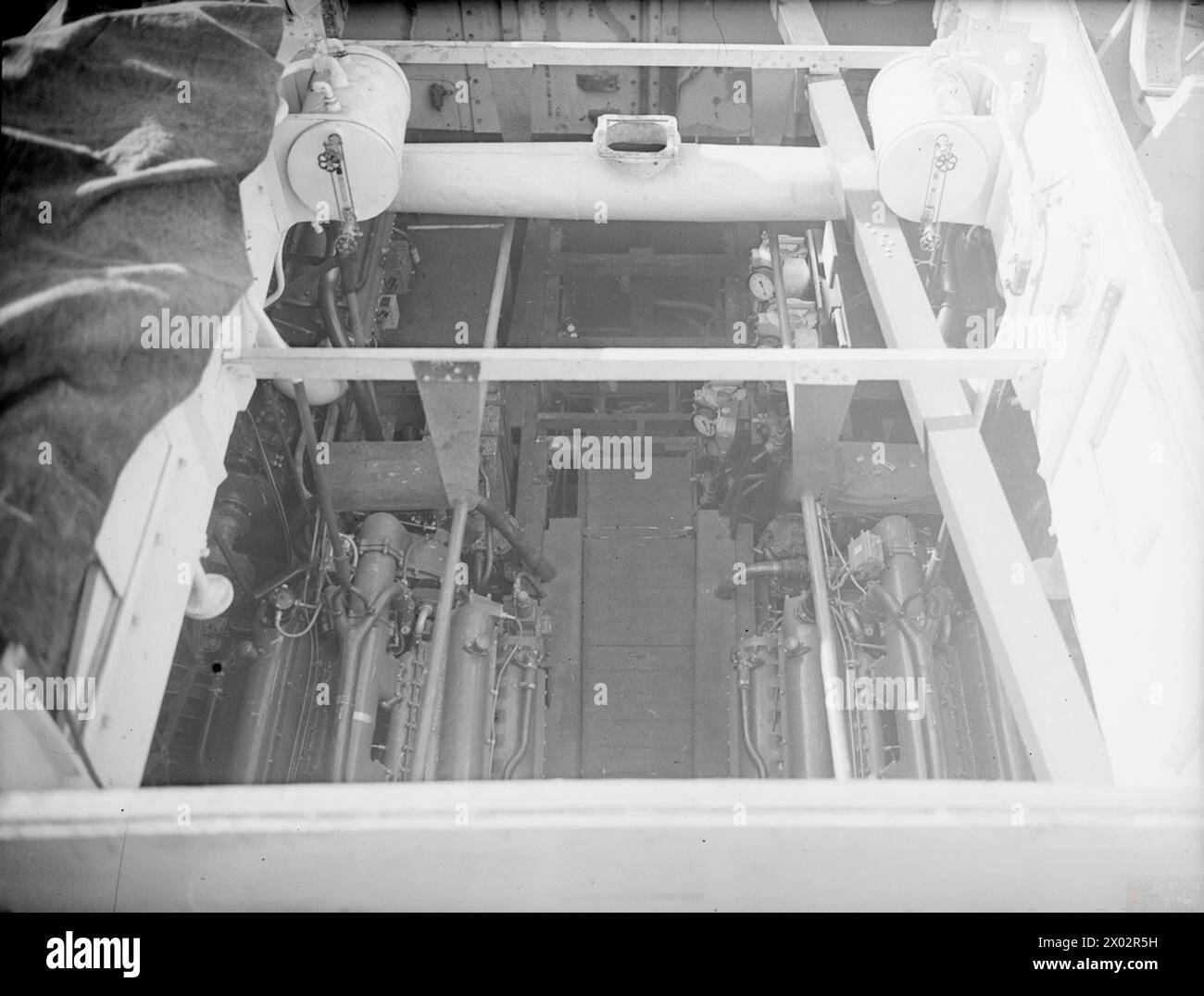On 18 April 1945, the engine room of a D-Class Fairmile MTB at Yarmouth ...